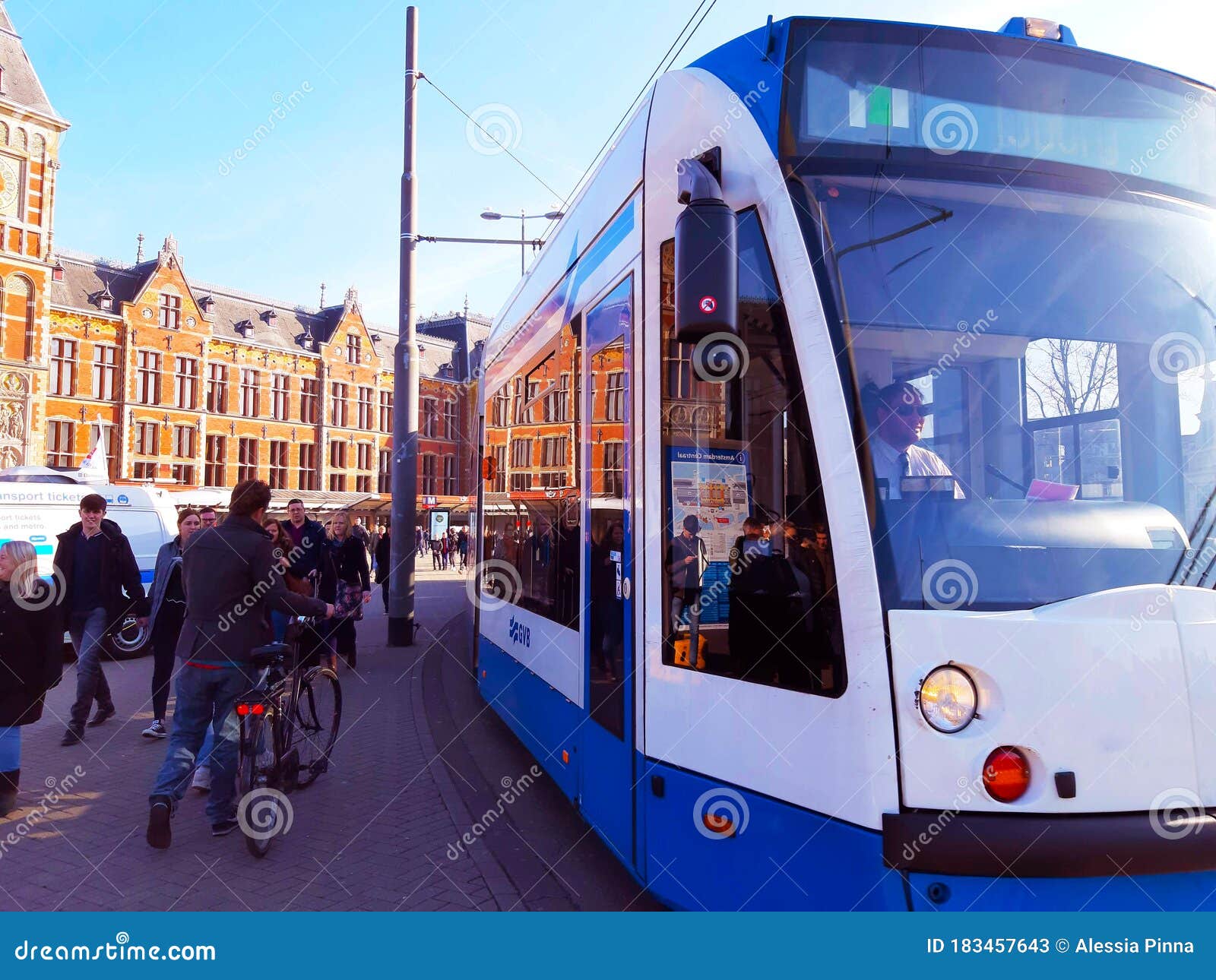 The Tram at the Dutch Stop in Front of the Amsterdam Train Station ...