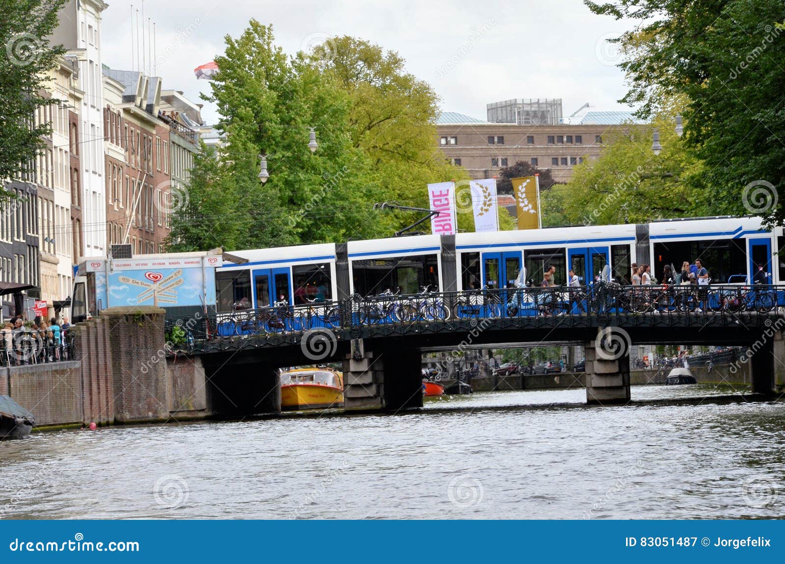 Tram Over a Bridge in Amsterdam Editorial Photography - Image of ...