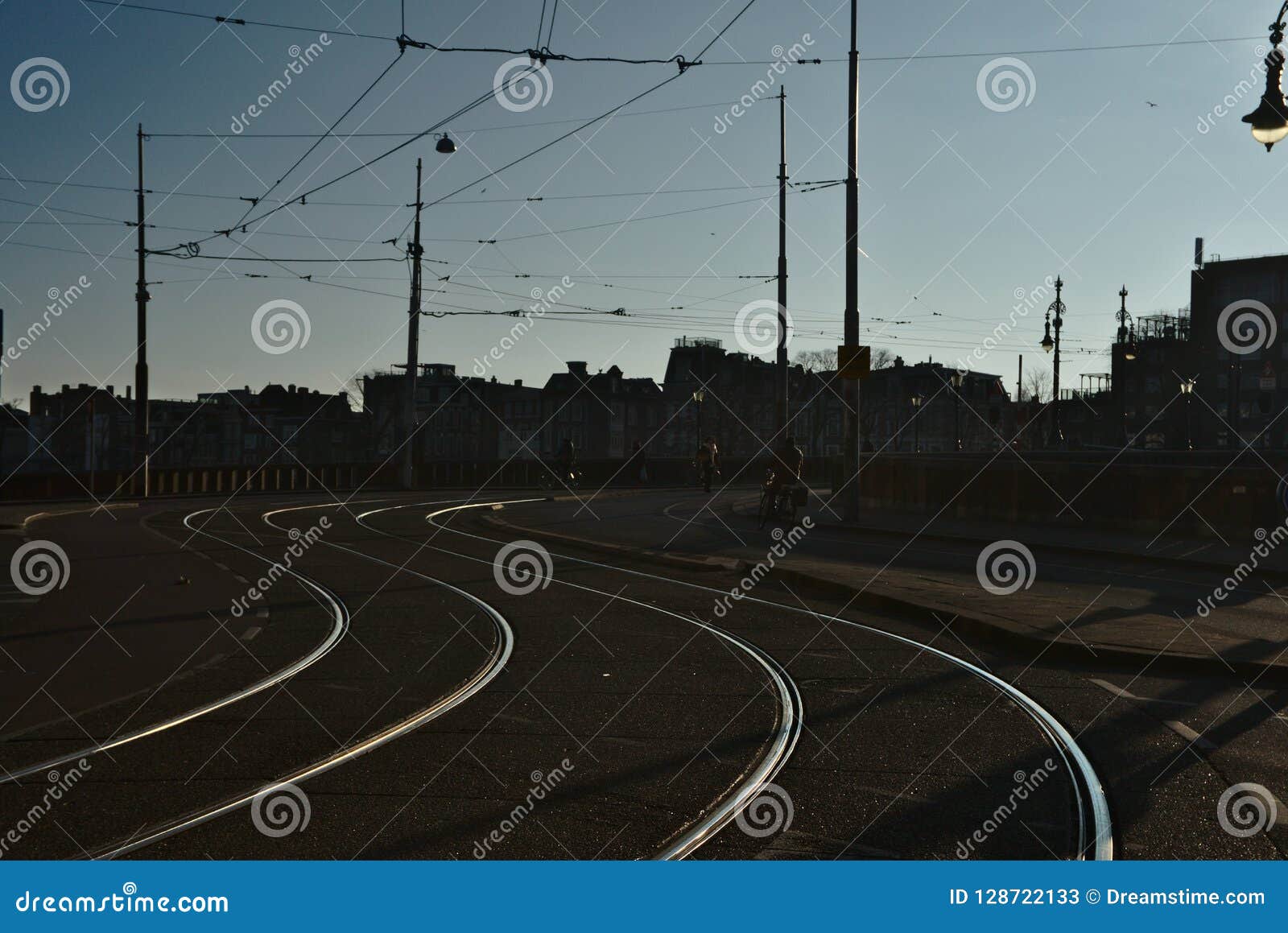 Tram rails in the sun stock image. Image of amsterdam - 128722133