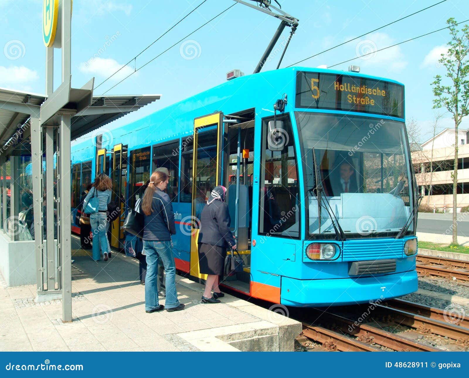 Tram at a stop stock image. Image of local, compound - 48628911