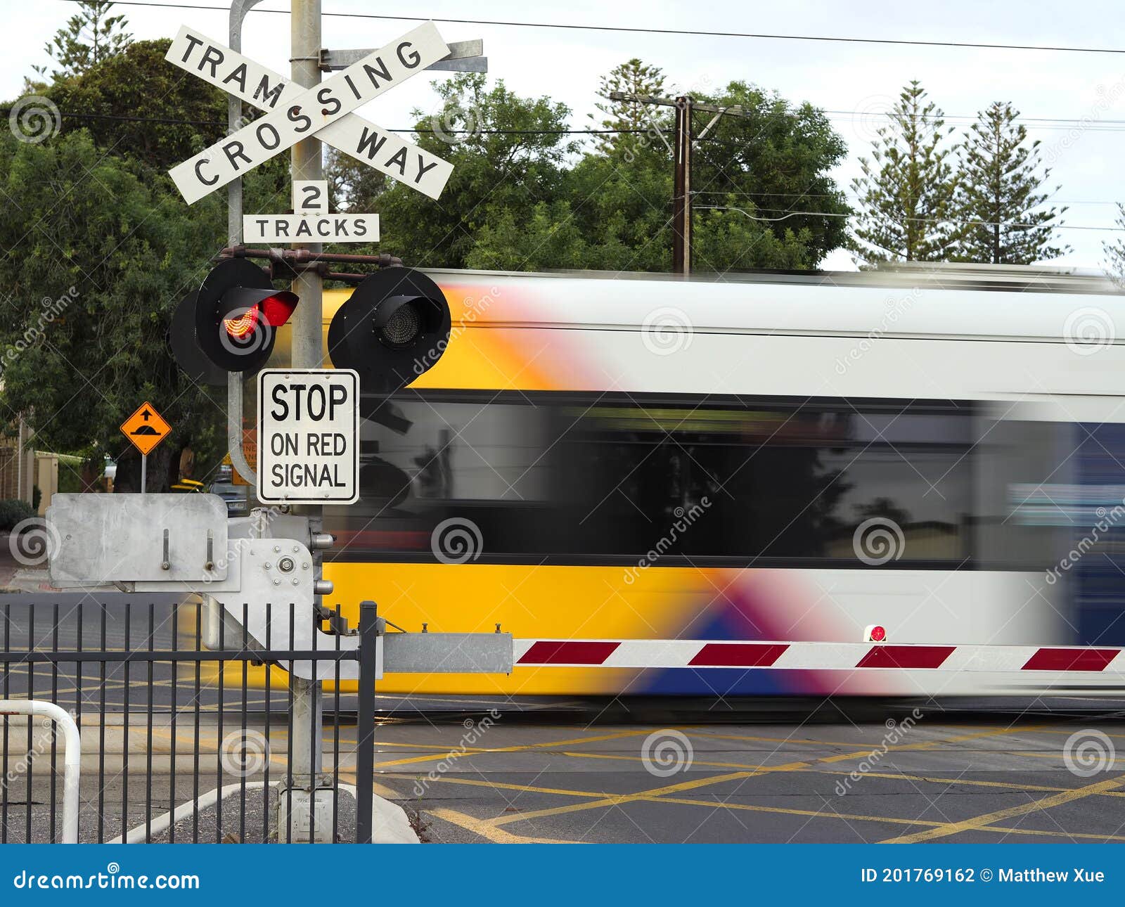 Tram Way Crossing Intersection with Passing Tram Stock Photo - Image of ...