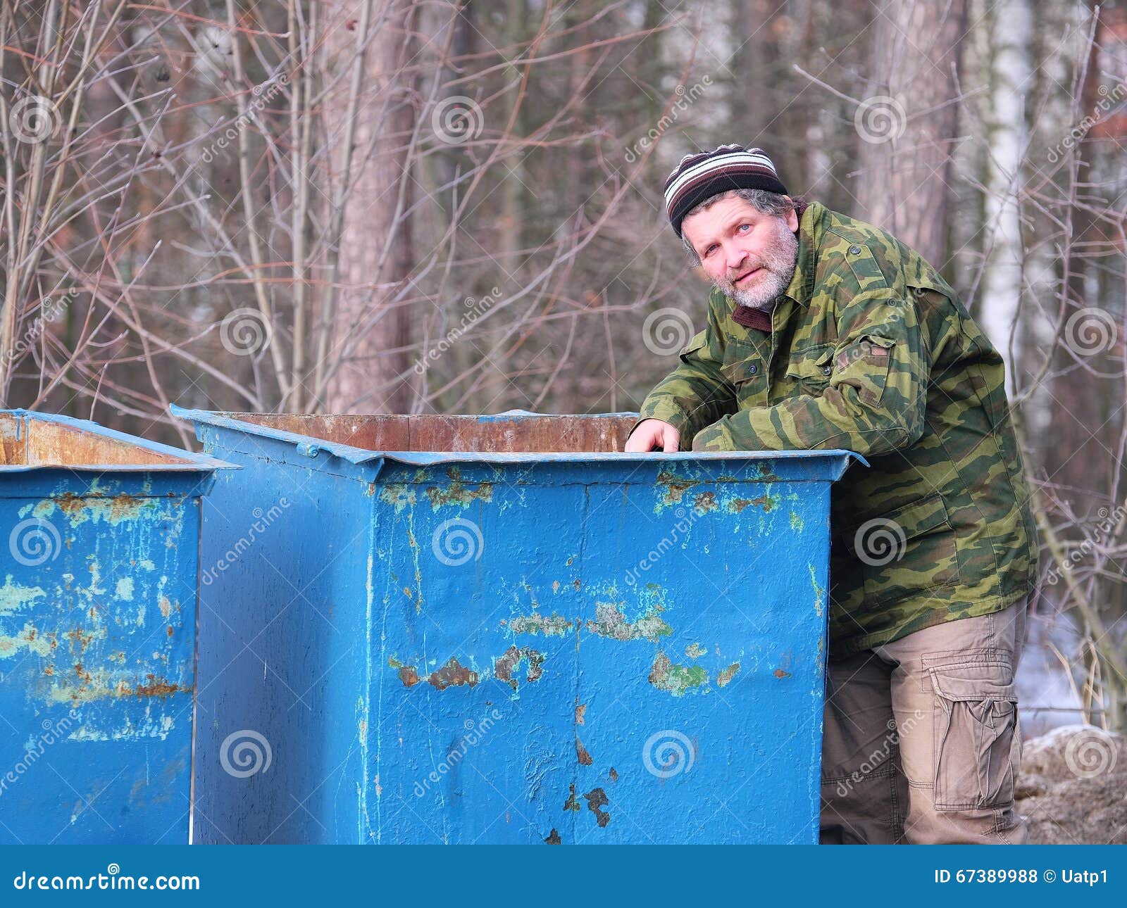Tramp near the garbage bin stock photo. Image of depression - 67389988