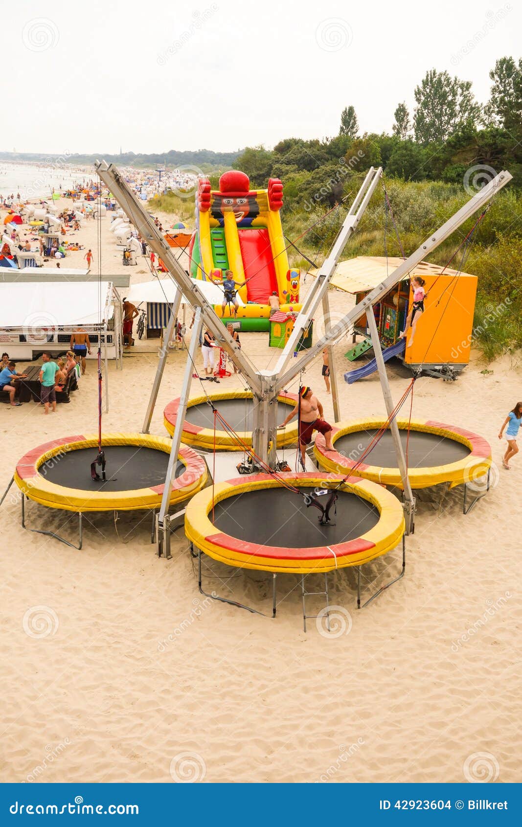 Trampoline on the beach editorial stock image. Image of kids - 42923604