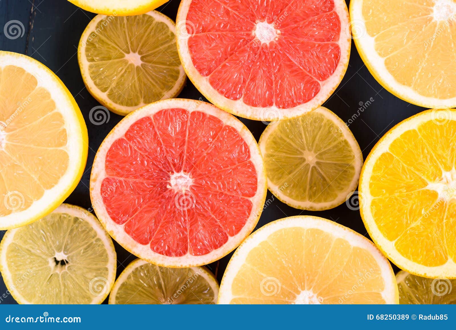 Tranches D'agrumes D'orange, De Pamplemousse Et De Citron Image stock ...