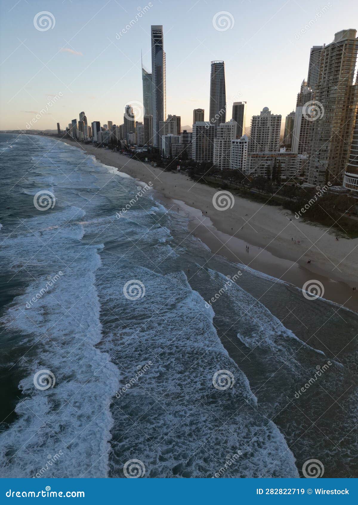 Tranquil Beach, with Distant Buildings in the Background Stock Image ...