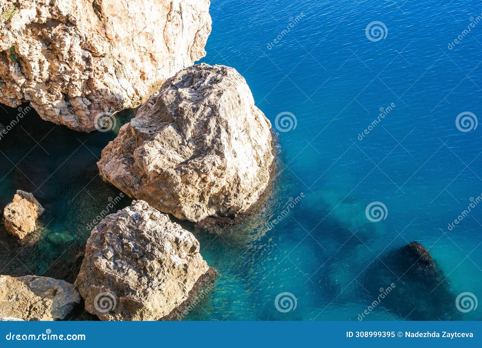 Tranquil Beach Scene with Azure Waters and Unique Rock Formations Under ...