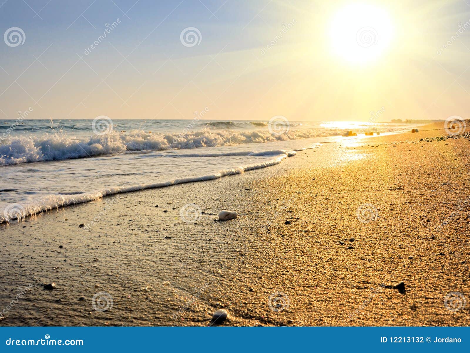 Tranquil beach sunset stock photo. Image of dark, gold - 12213132