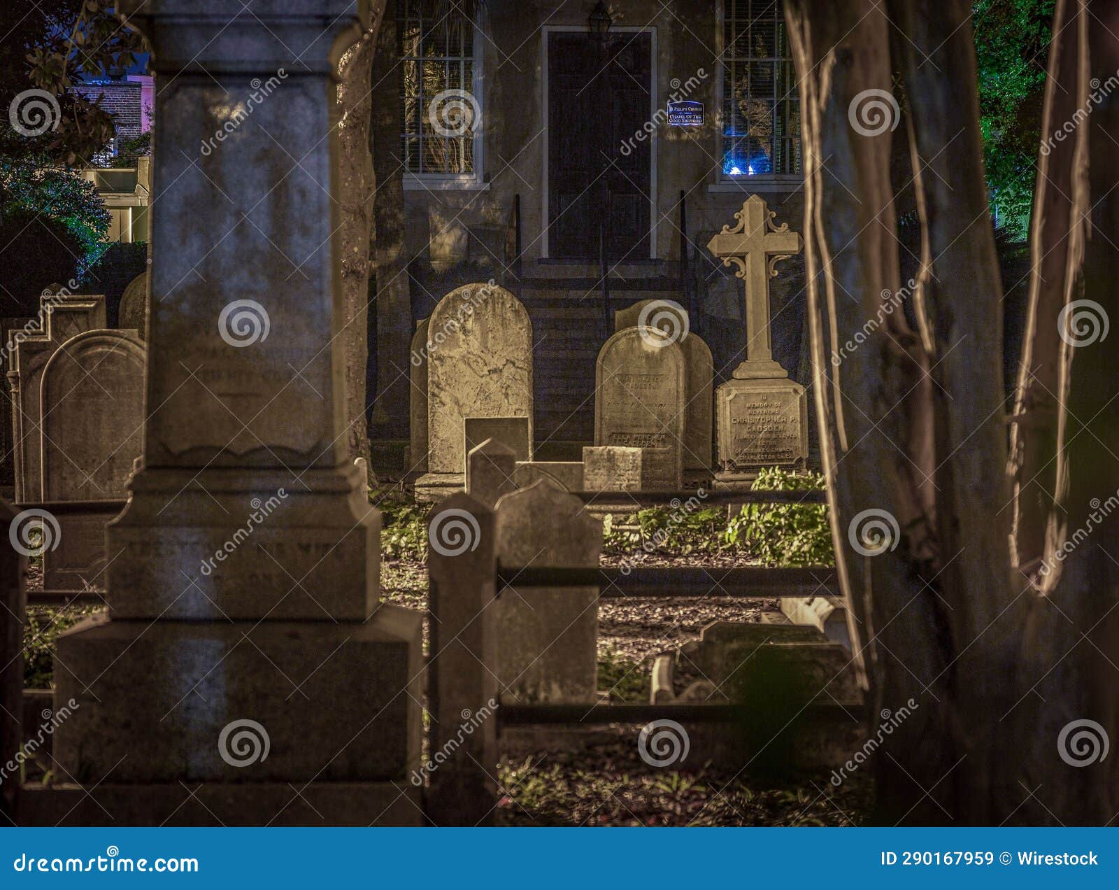Tranquil Evening Scene Featuring Two Bare Trees in a Cemetery Editorial ...
