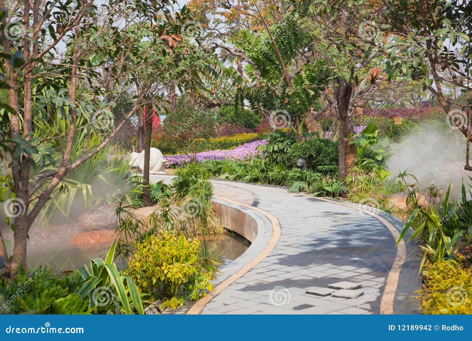Tranquil Garden Walkway stock photo. Image of land, ornamental - 12189942