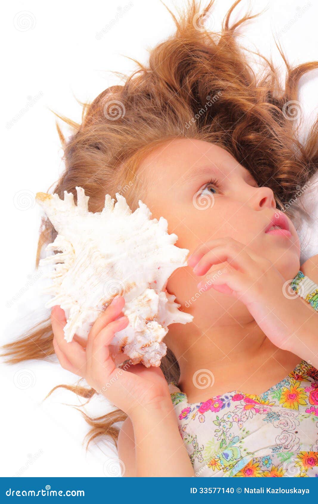 Tranquil Little Girl with Seashell Stock Photo - Image of girl, light ...