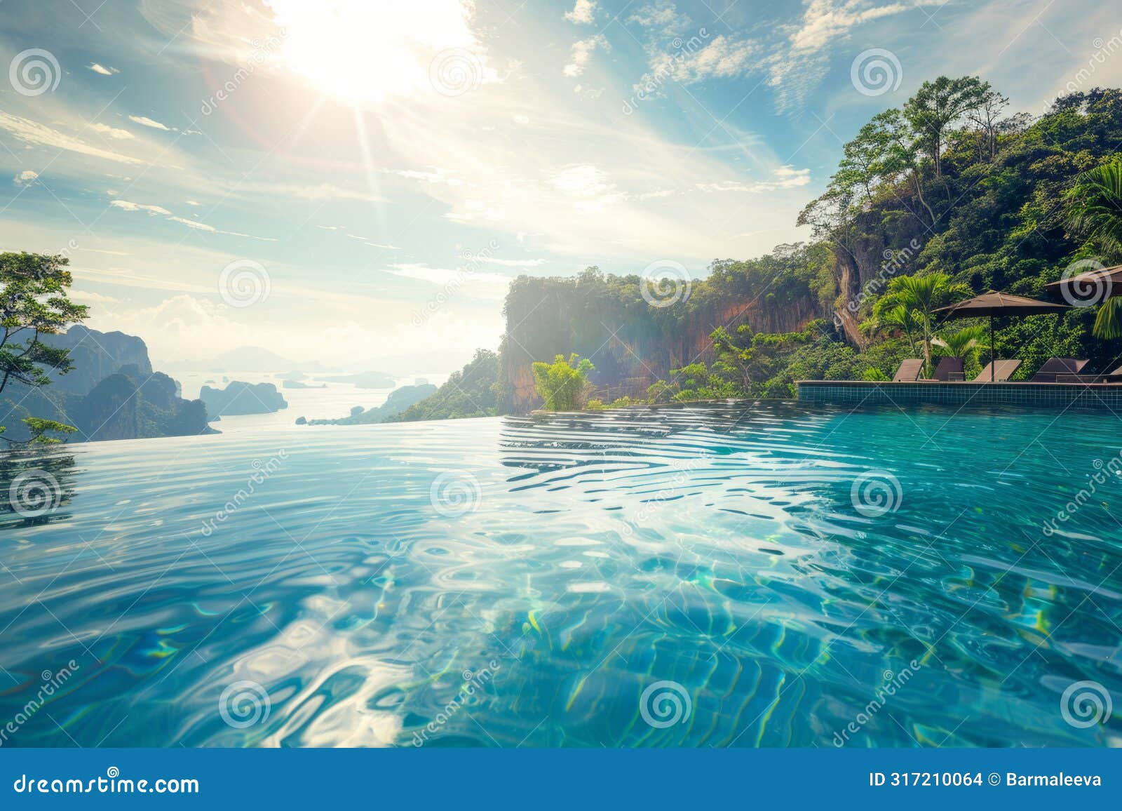 Luxury Infinity Pool with Rainforest View Below Sunny Blue Sky Stock ...