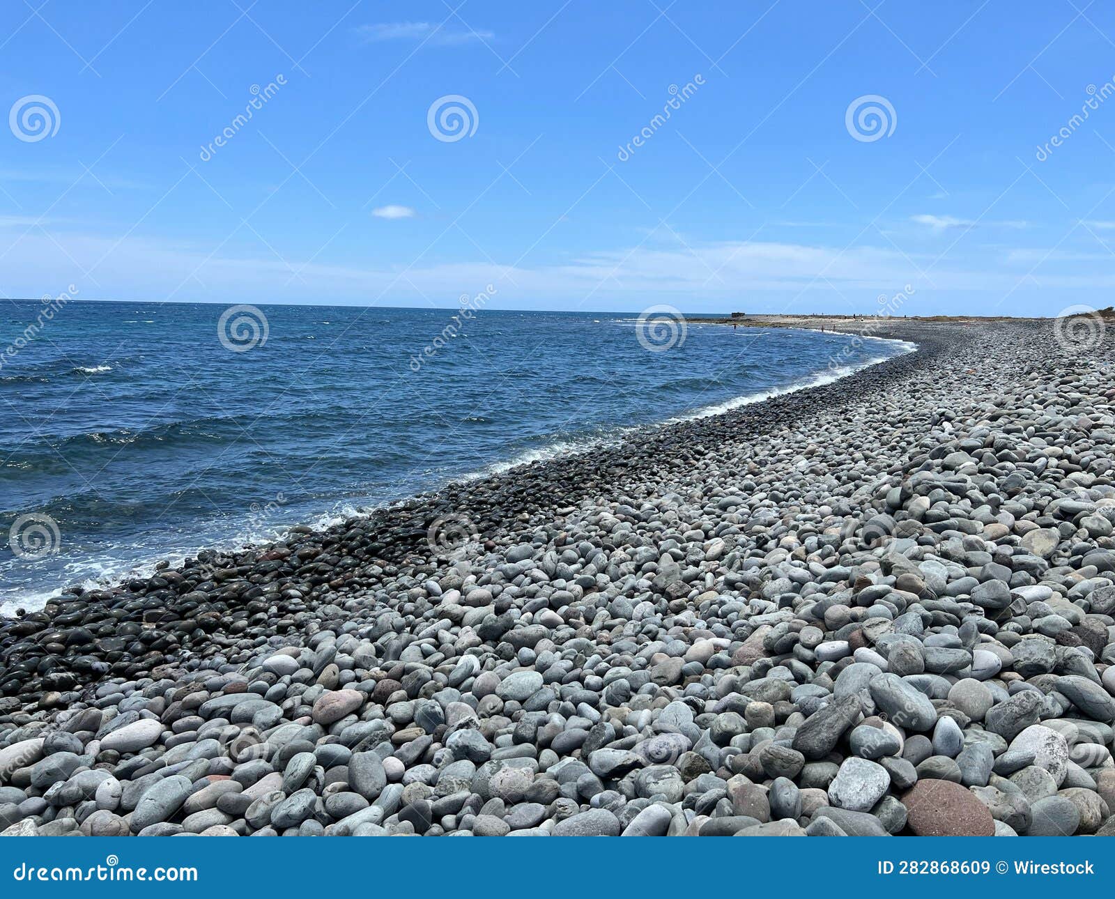 Tranquil Ocean Shore Featuring a Lot of Pebbles Stock Image - Image of ...