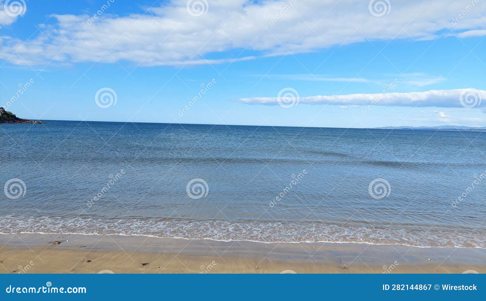 Tranquil Ocean View Featuring a Calm, Blue Sky with Clouds Stock Image ...