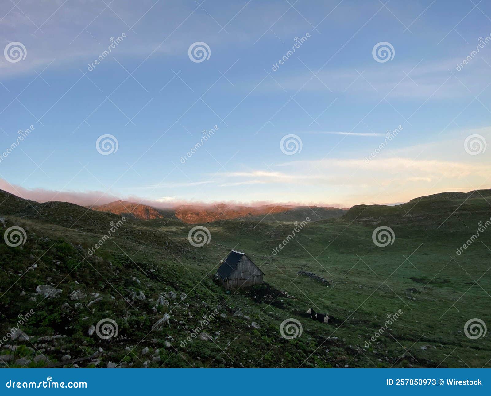 Tranquil Scenery of the Hills with a Single Hut Stock Image - Image of ...