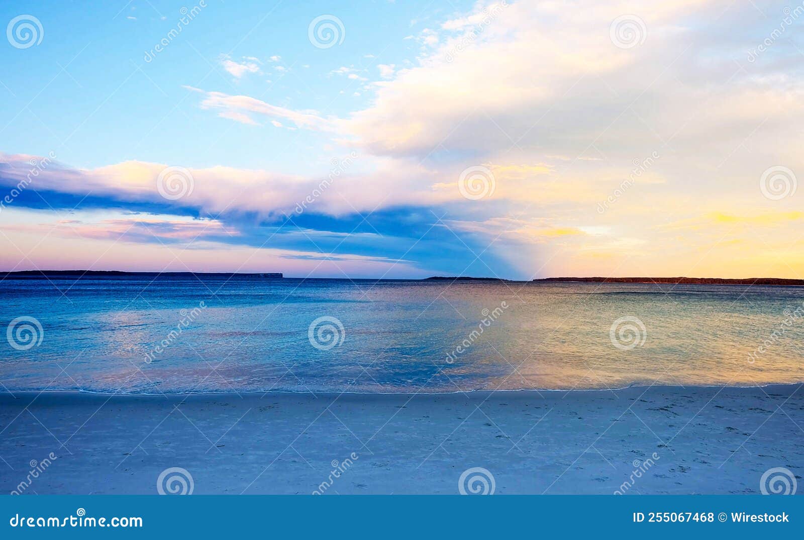 Tranquil Scenery of a Sandy Beach during Sunset Stock Photo - Image of ...