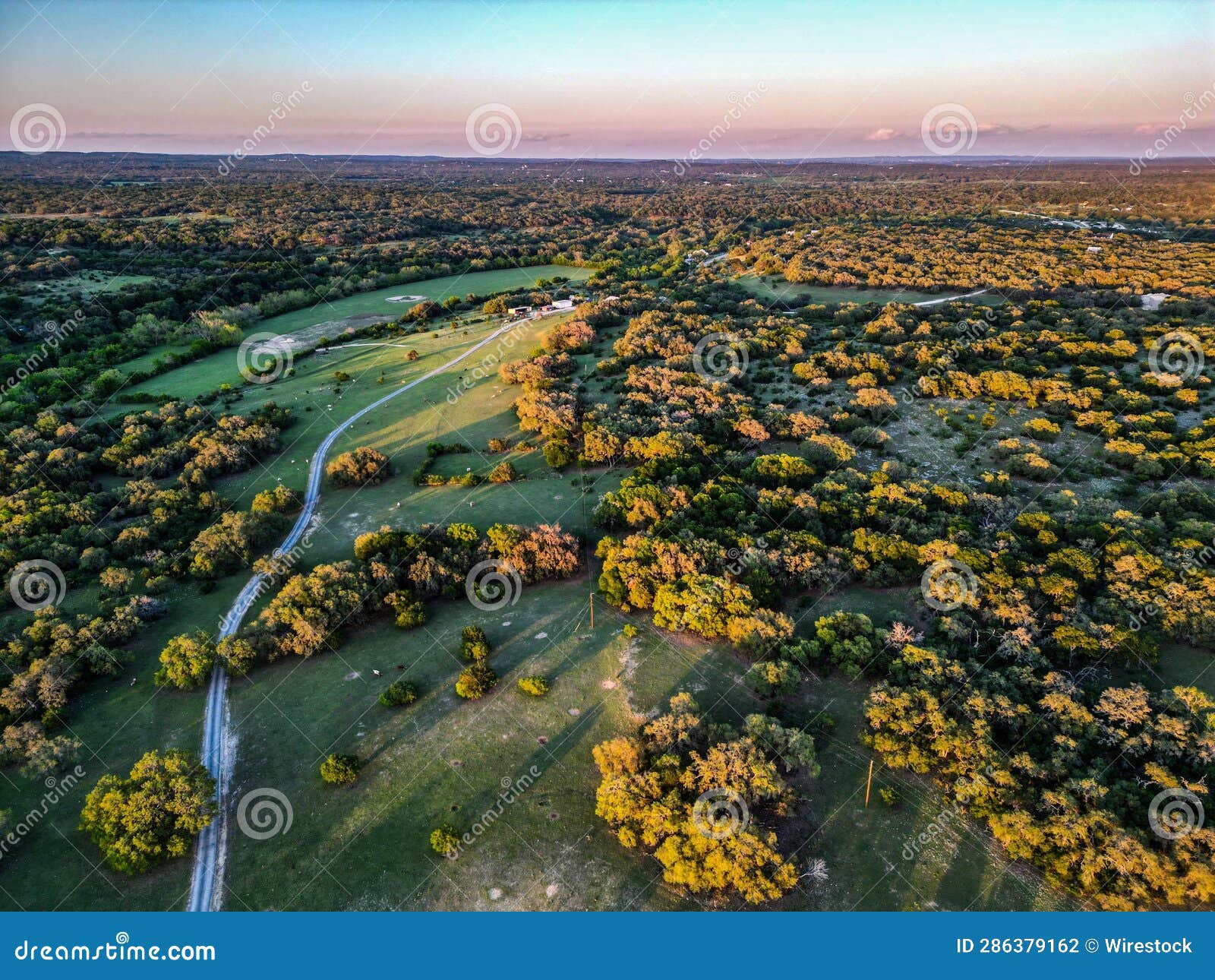 Tranquil View of a Breathtaking Valley at Sunset, Surrounded by Lush ...