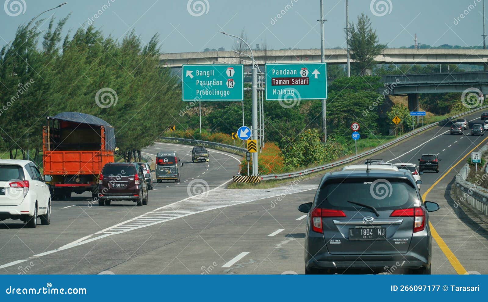 Trans Java Toll Road at Noon. There are Signs for the City of Bangil ... Trans Java Toll Road at Noon. There are Signs for the City of Bangil ...