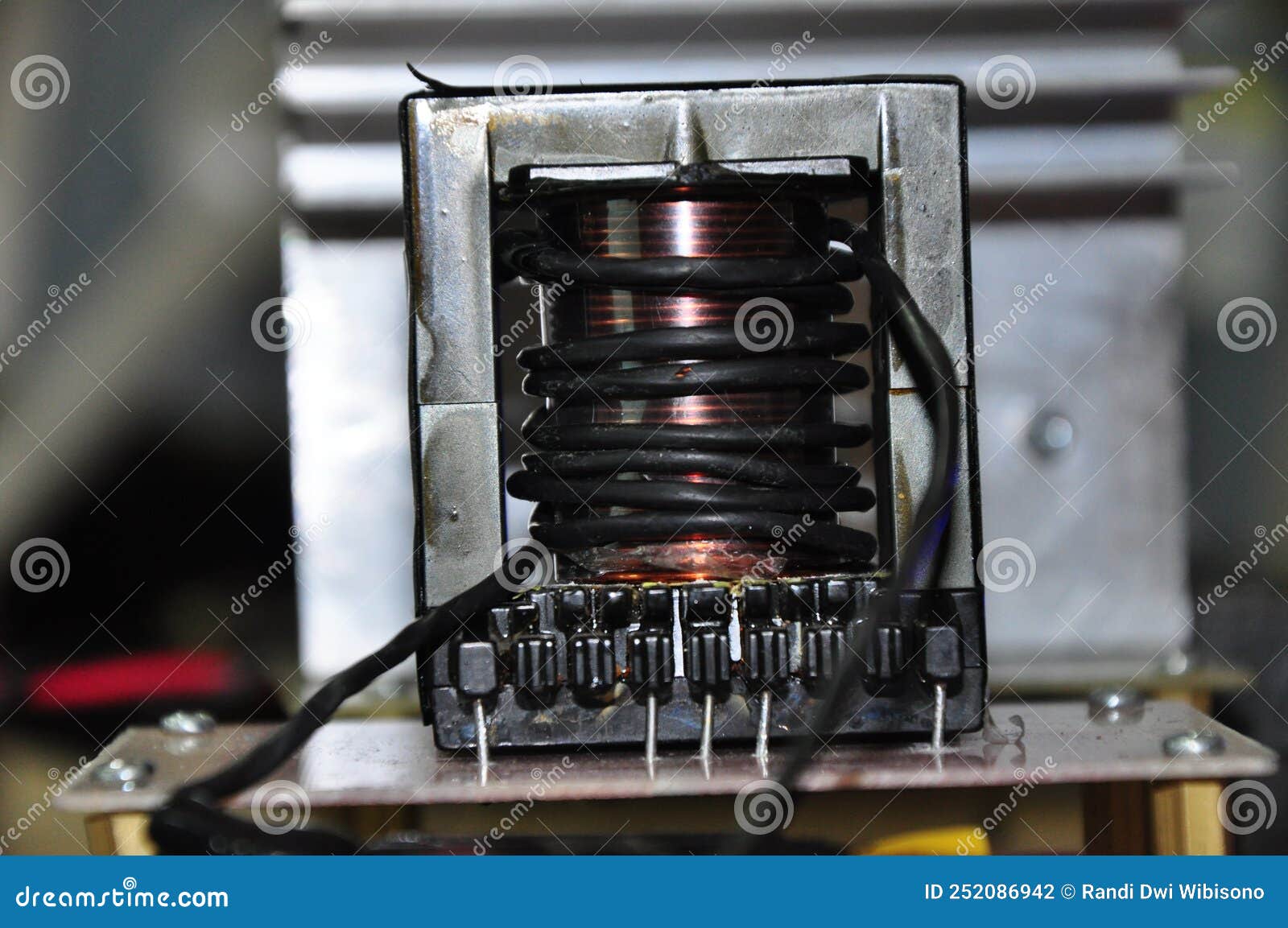 Transformer with a Core Wrapped in Copper and Black Wire Stock Photo ...