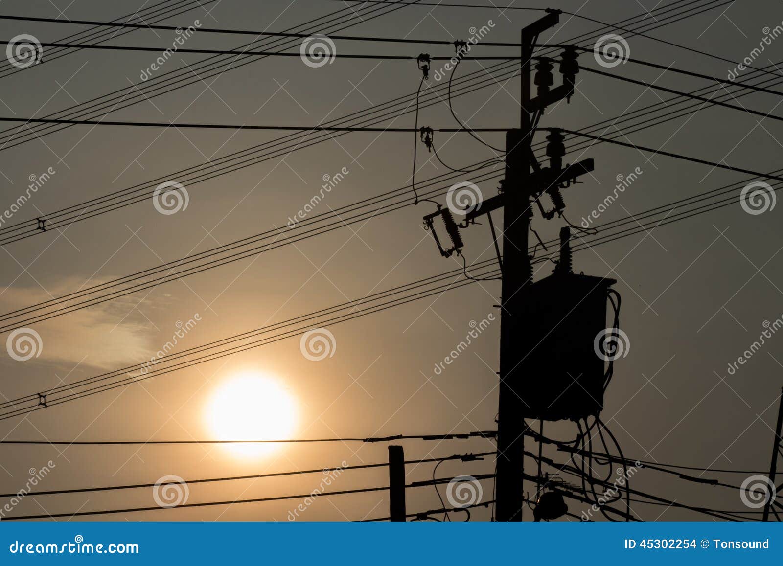 Transformer and Power Lines on Electric Pole at the Sunset Stock Photo ...