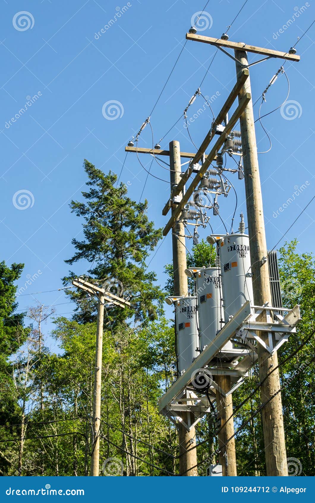 Electricity Transformers on a Pole Stock Photo - Image of equipment ...