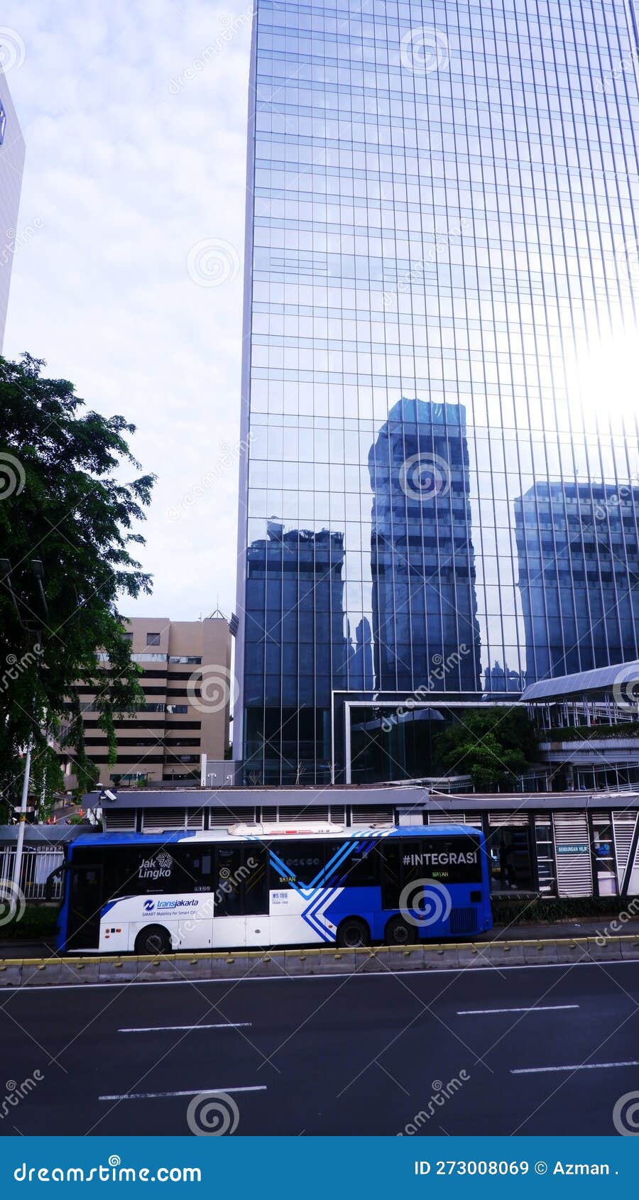 Transjakarta Bus, Main Public Transportation with Skyscraper in the ...