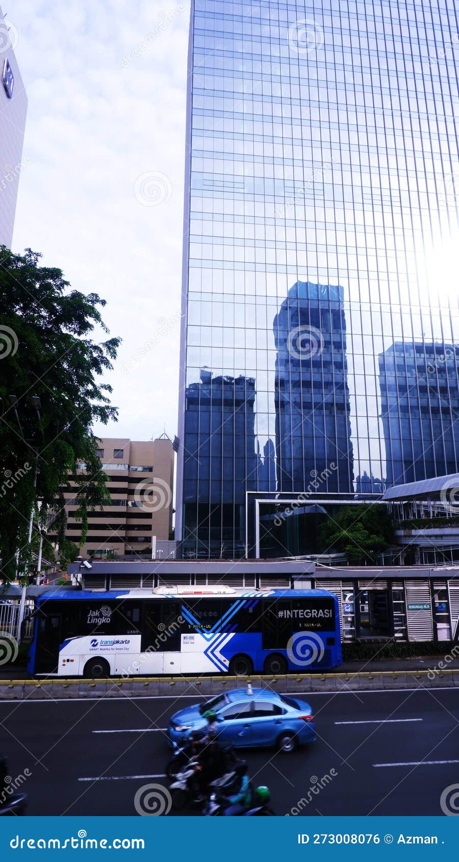 Transjakarta Bus, Main Public Transportation with Skyscraper in the ...