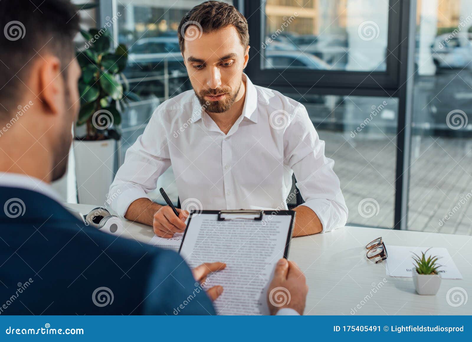 Translator Working with Businessman and Documents Stock Image - Image ...