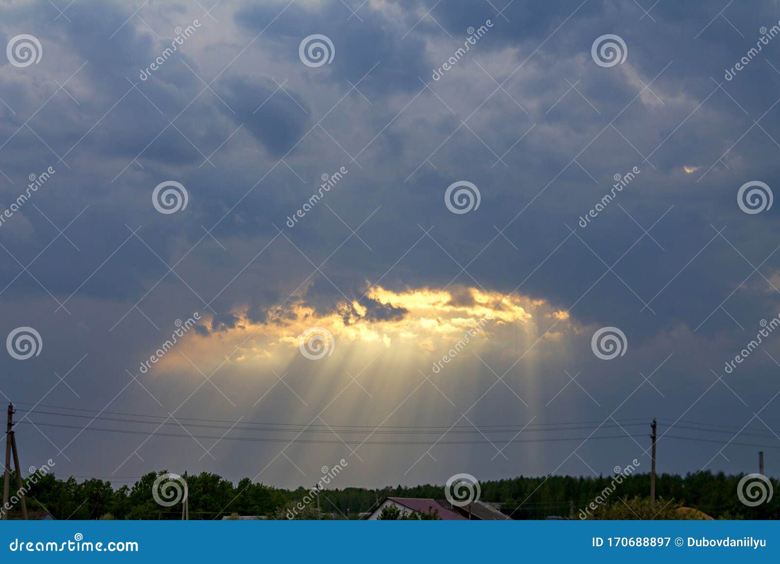 Translucent Rays of the Sun through the Blue Stormy Sky Stock Image ...
