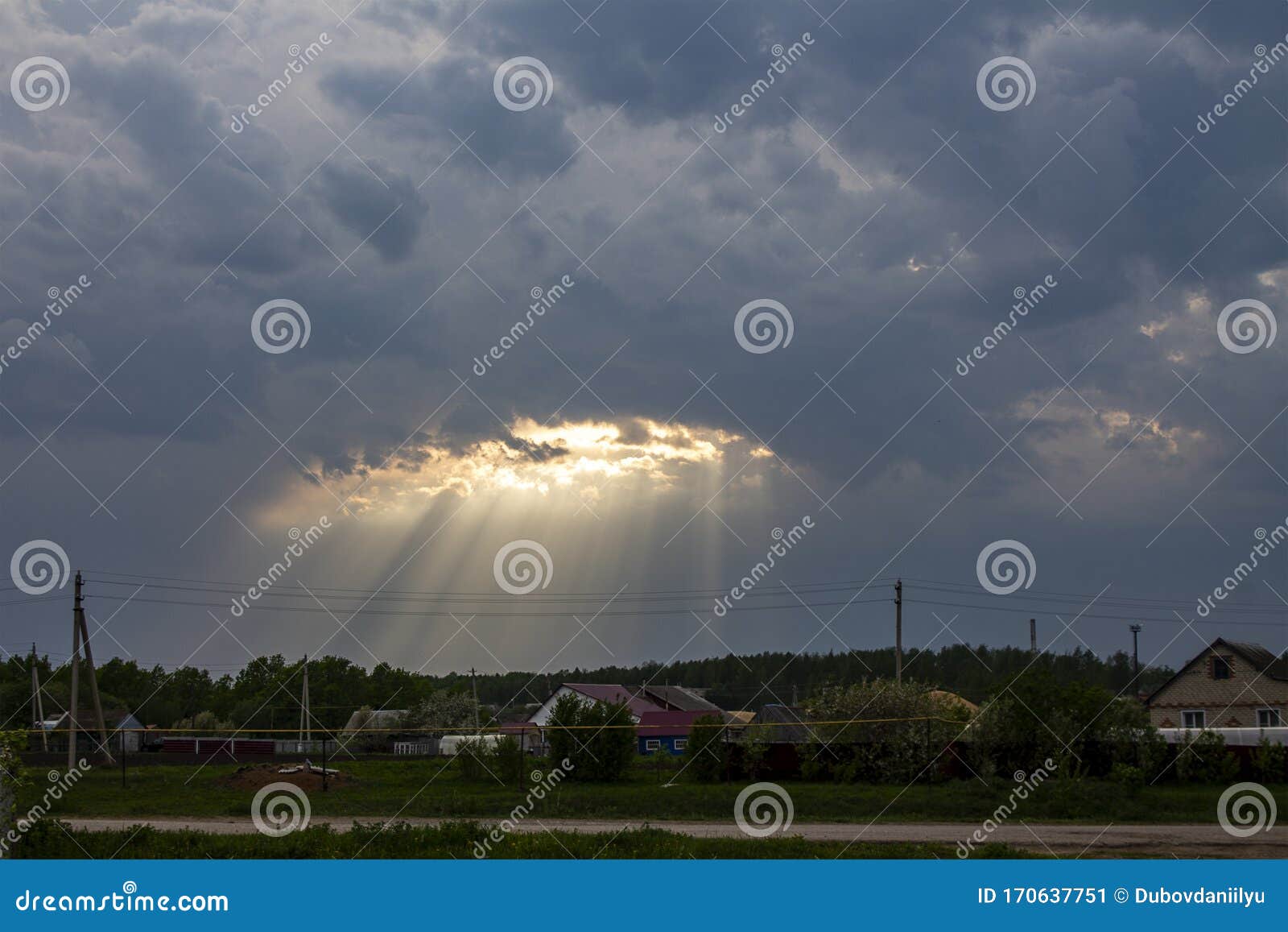 Translucent Rays of the Sun through the Blue Stormy Sky Stock Image ...