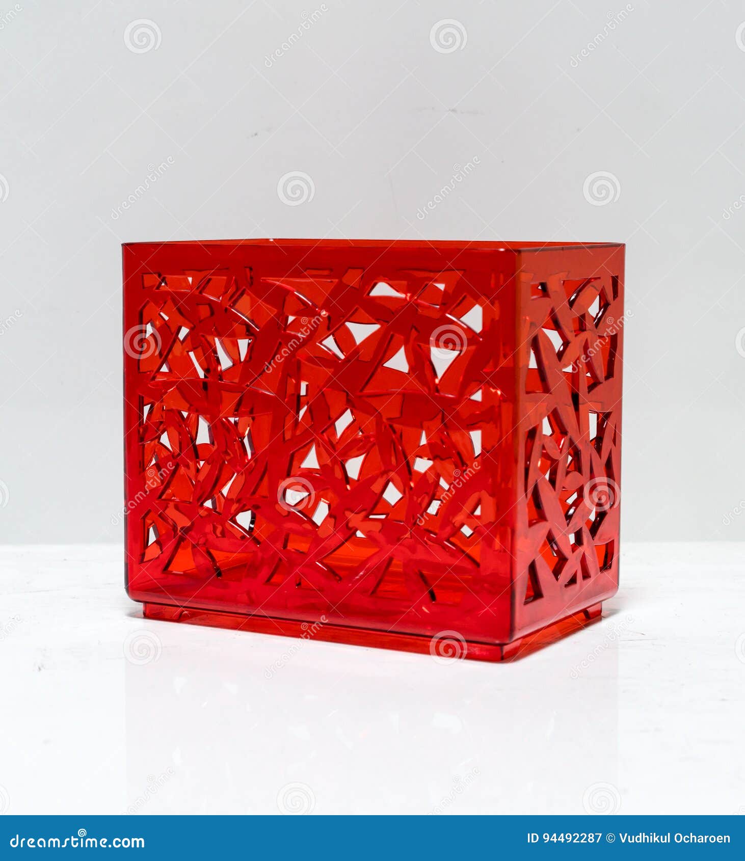 Translucent Red Plastic Box with Perforated Pattern Body Stock Image ...