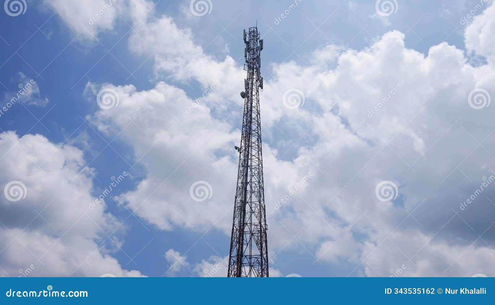 Transmitter Tower with Blue Sky and Clouds Background Stock Photo ...