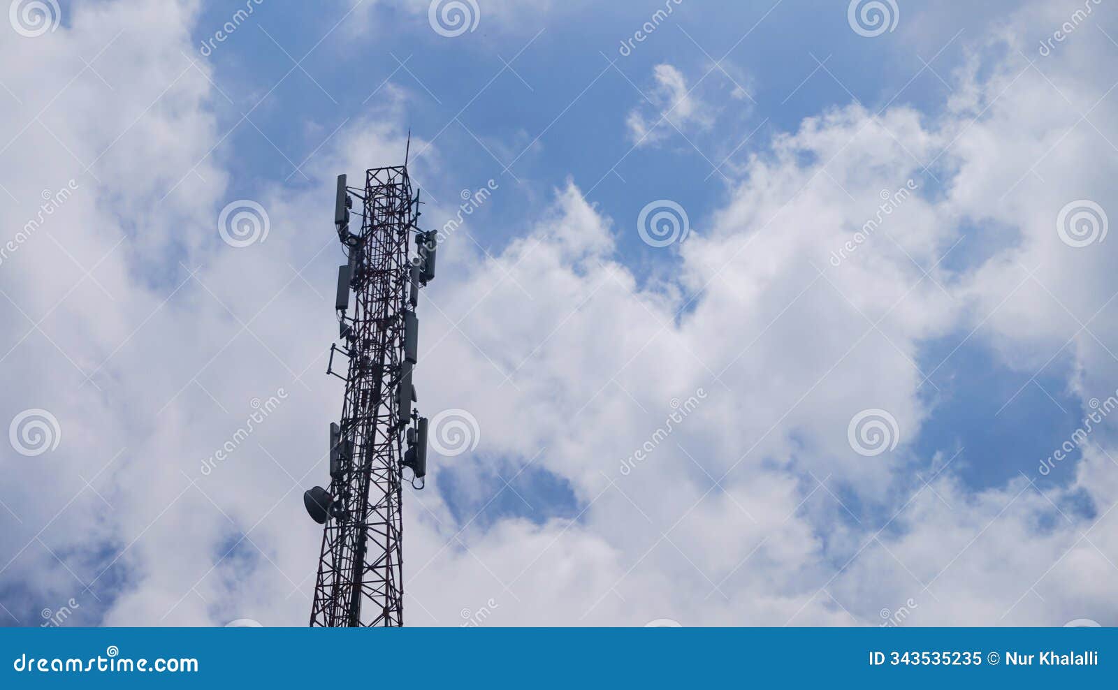 Transmitter Tower with Blue Sky and Clouds Background Stock Image ...