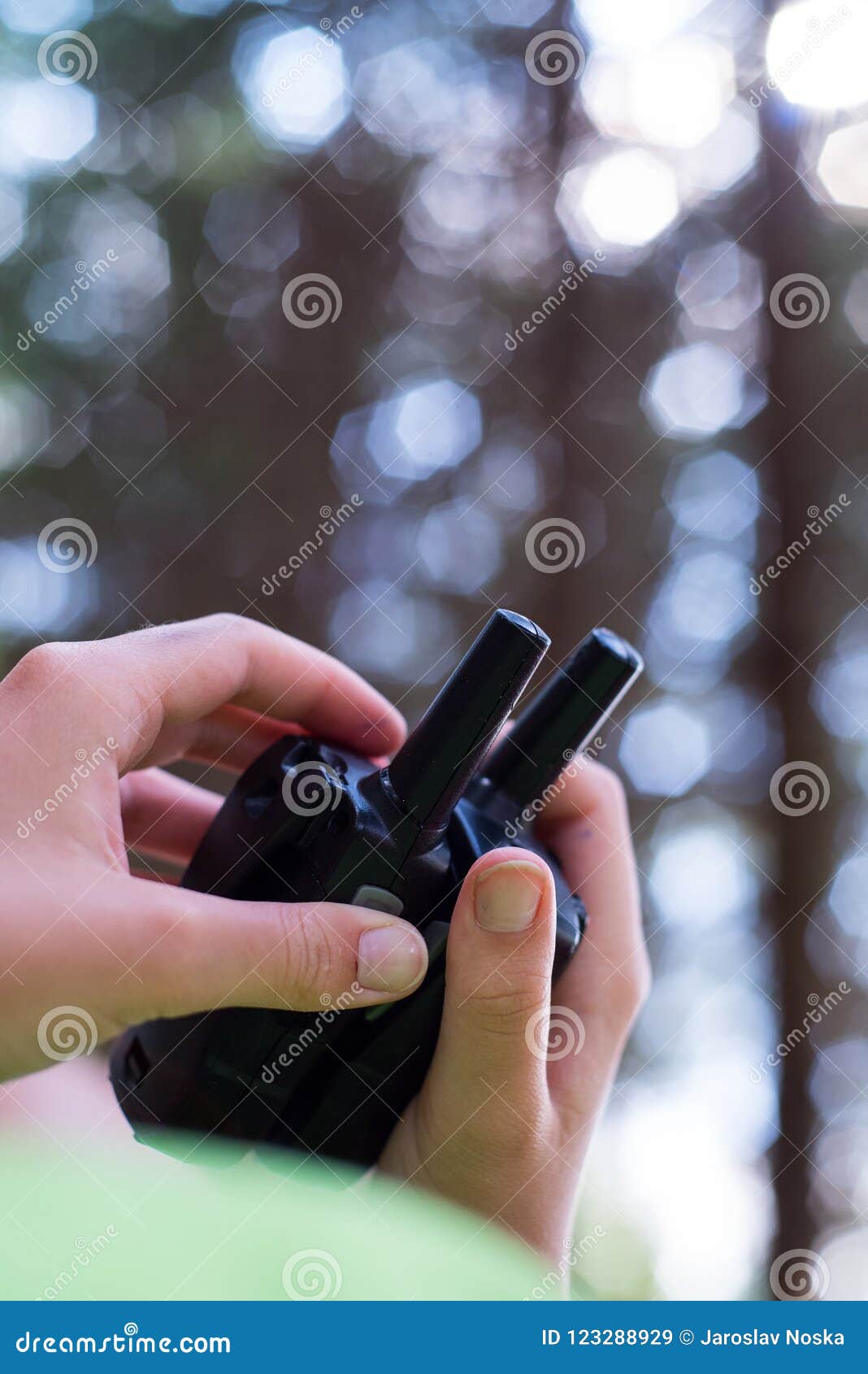 Transmitters in hand. stock image. Image of communication - 123288929