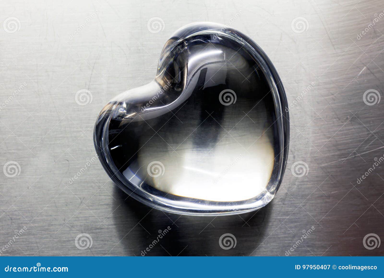 A Transparent Crystal Heart on Metal Stock Image - Image of facet ...