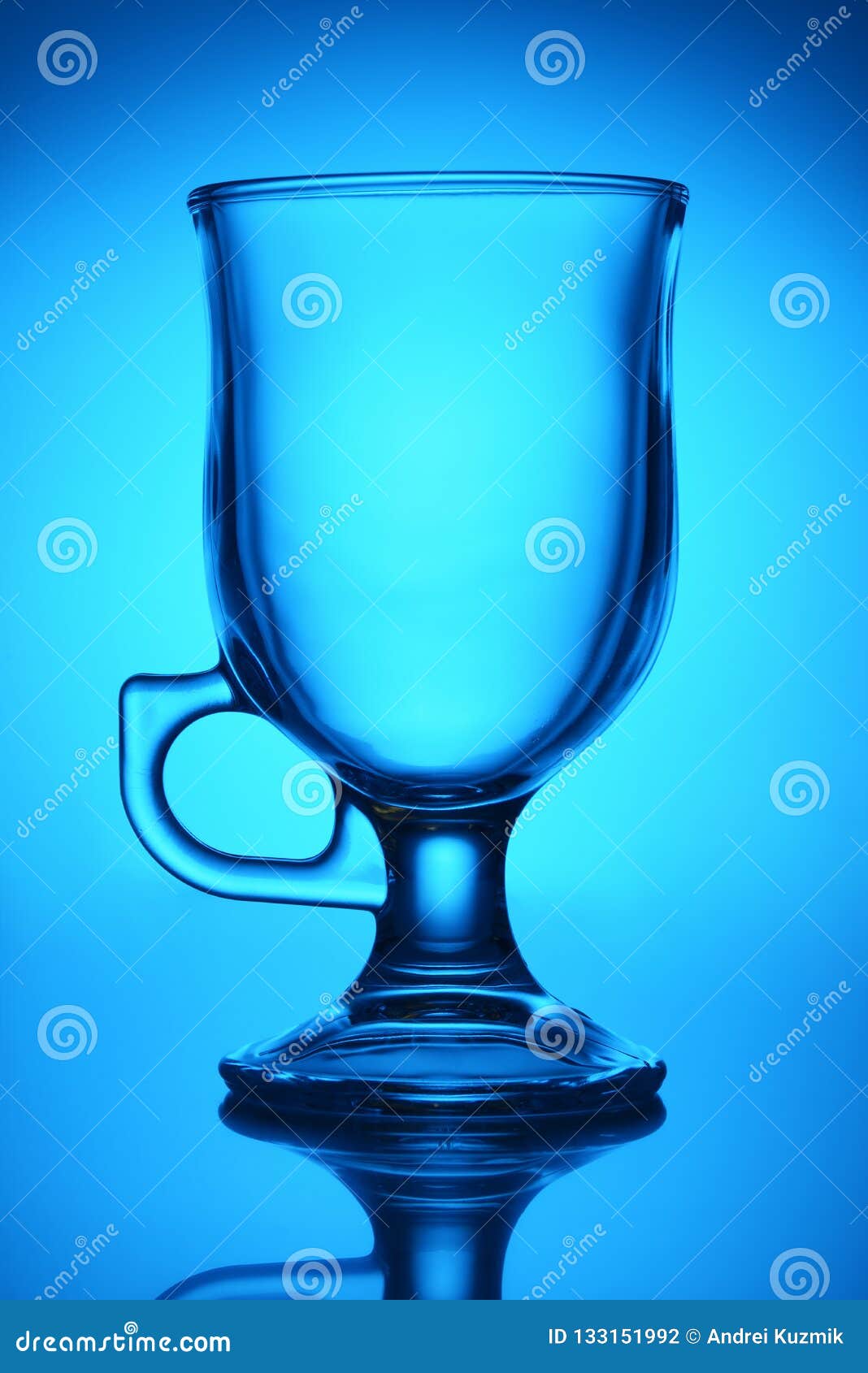 Transparent Cup on Blue Background Stock Photo - Image of classic ...