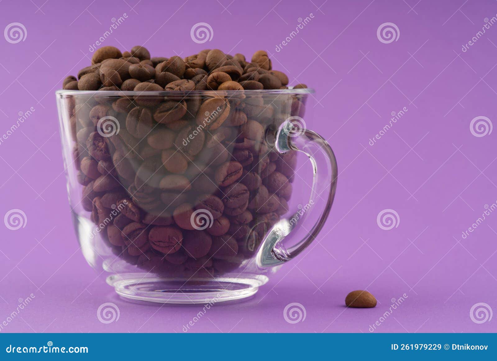 A Transparent Cup Filled To the Brim with Coffee Beans. Space for Text ...