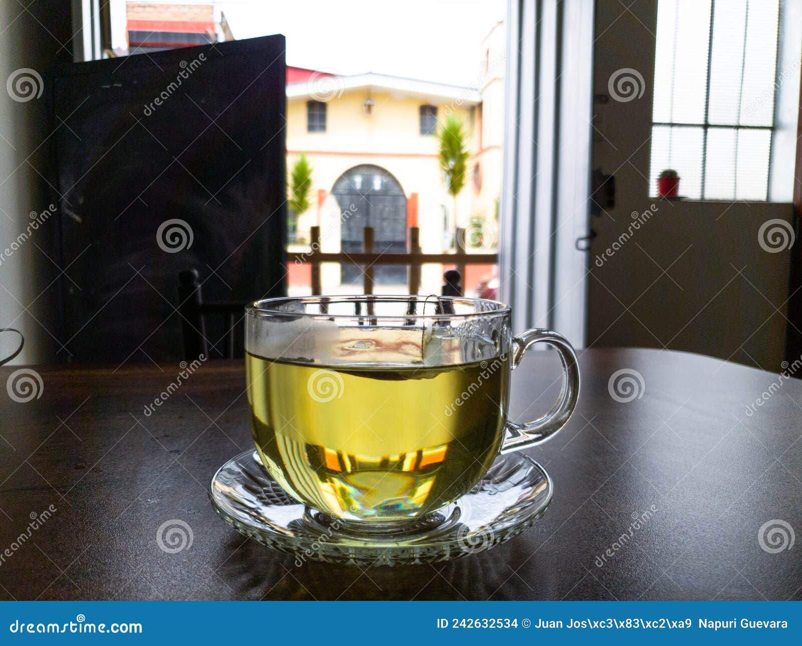 Transparent Cup of Hot Tea on a Wooden Table on a Background of Nature ...