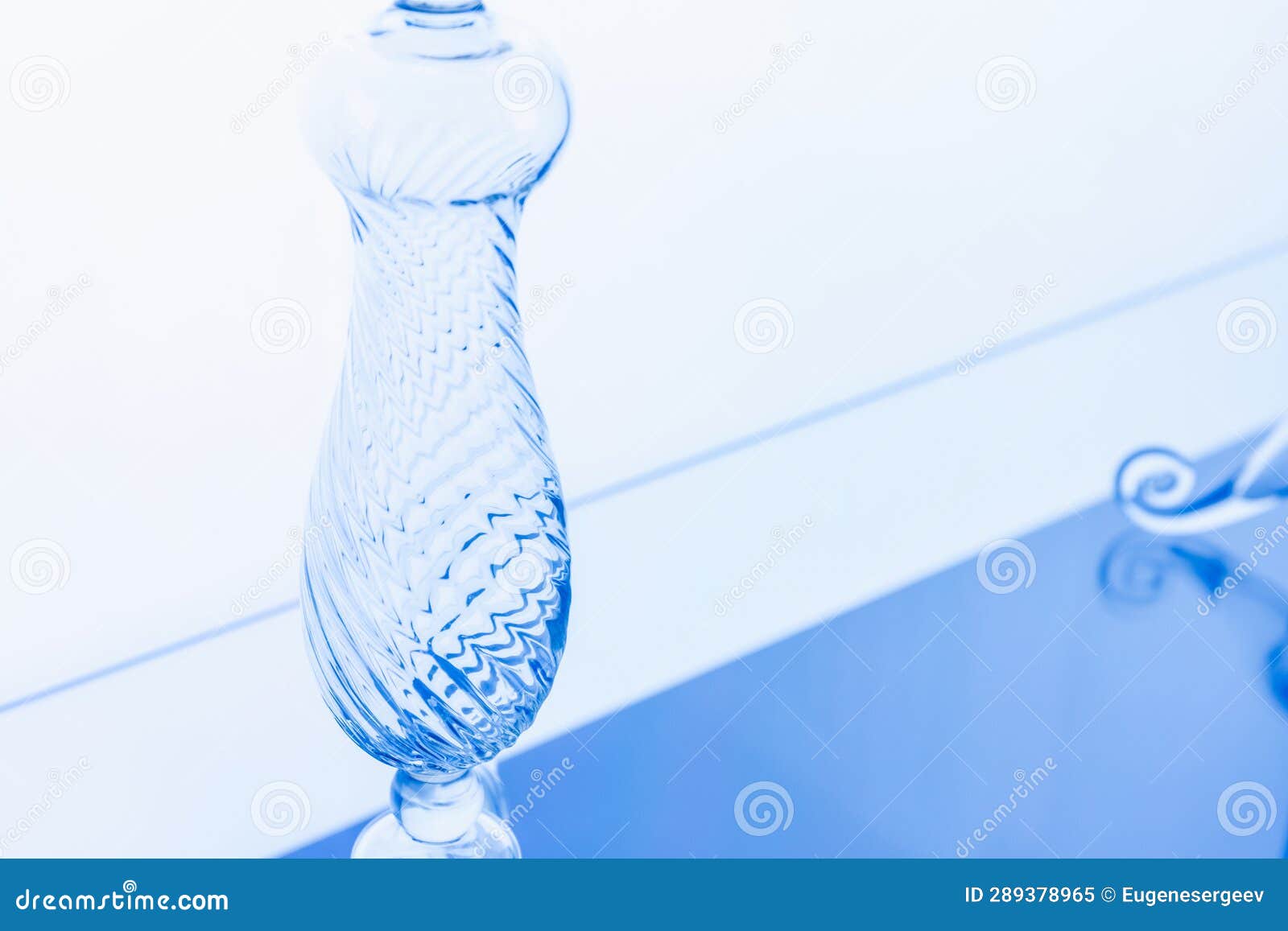 Transparent Empty Vase Over Light Blue Wall Background Stock Image ...