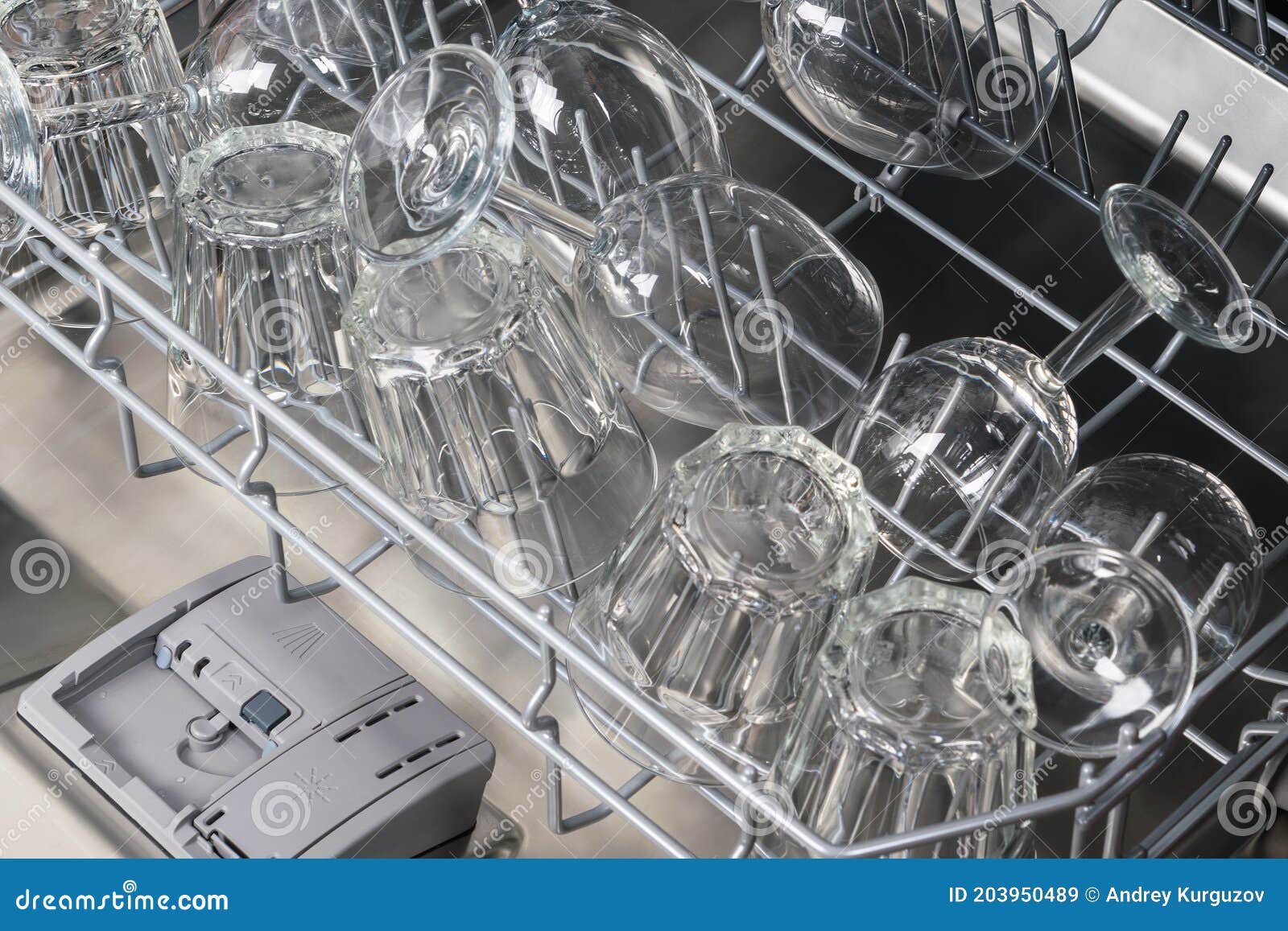 Transparent Glass Goblets in the Dishwasher Compartment, Close-up Top ...