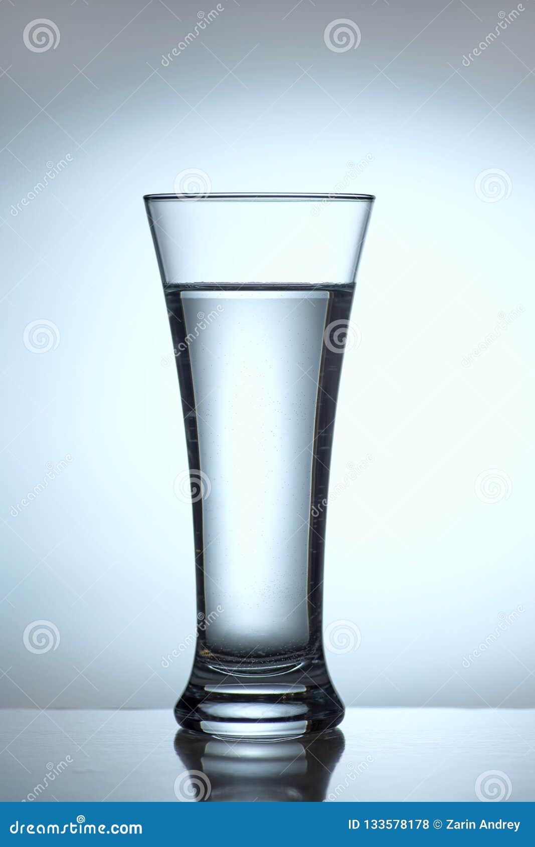 Transparent Glass with Water, Lights at the Back, Close-up Stock Photo ...