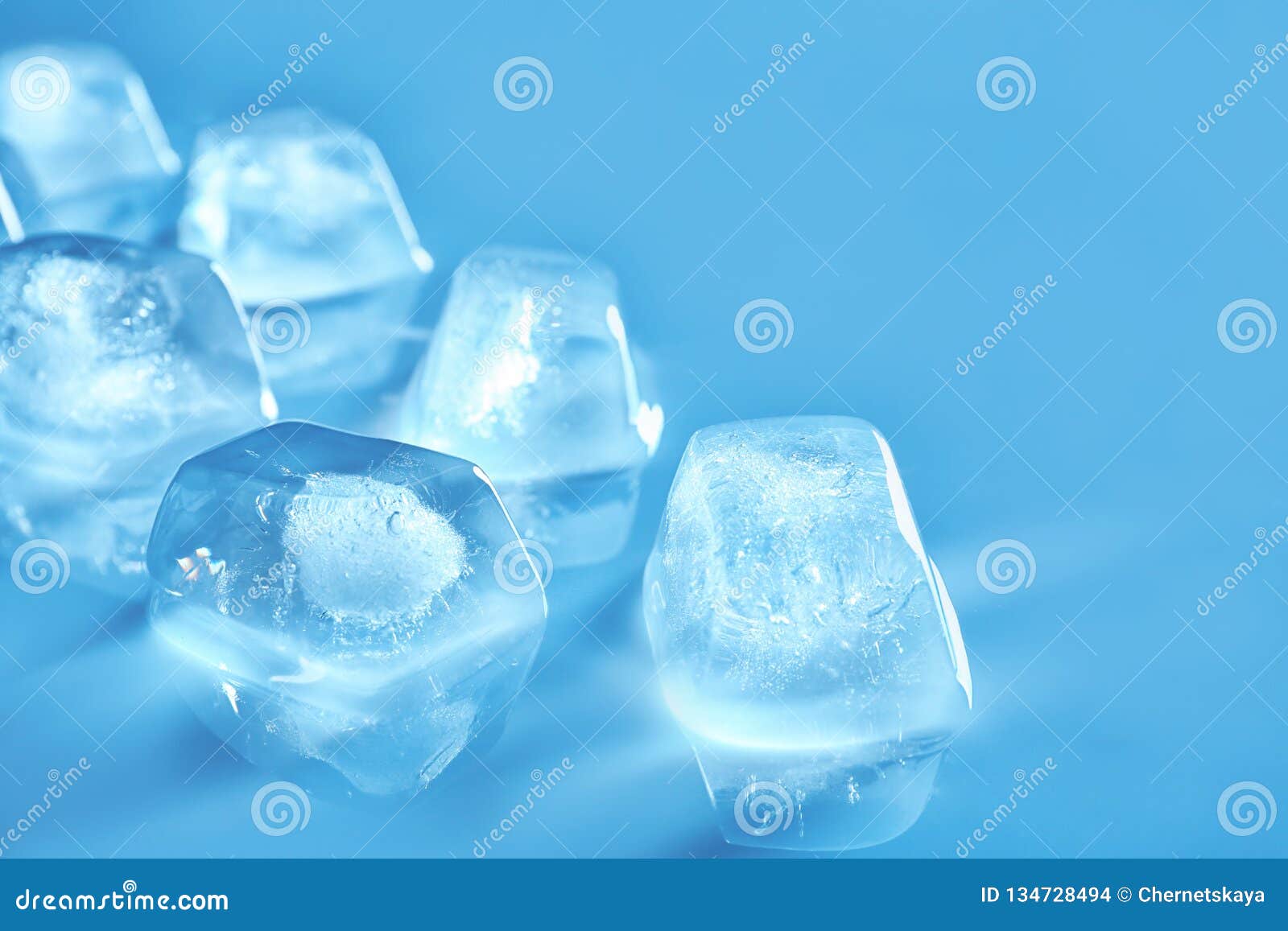 Transparent Ice Cubes on Color Mirror Surface Stock Photo - Image of ...