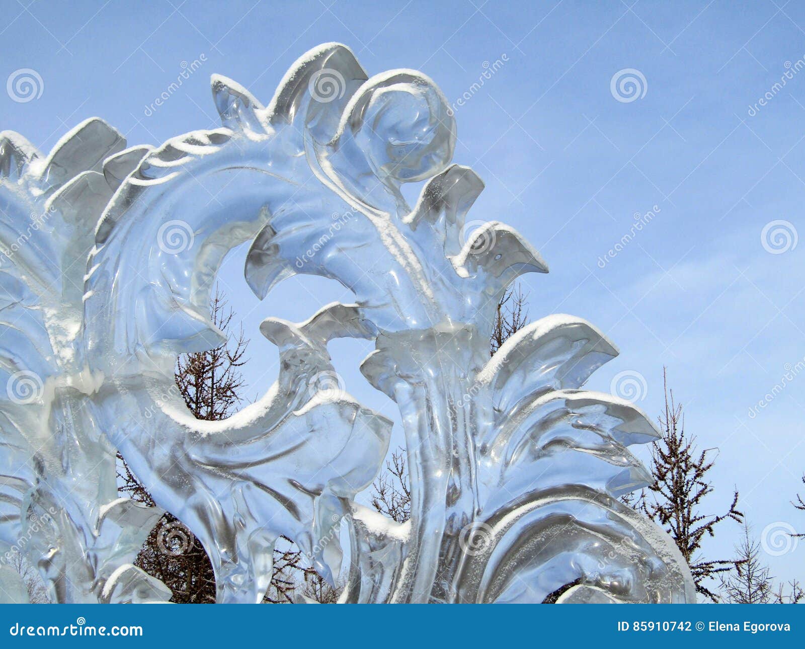 Transparent Ice Sculpture Against the Sky Stock Photo - Image of plant ...