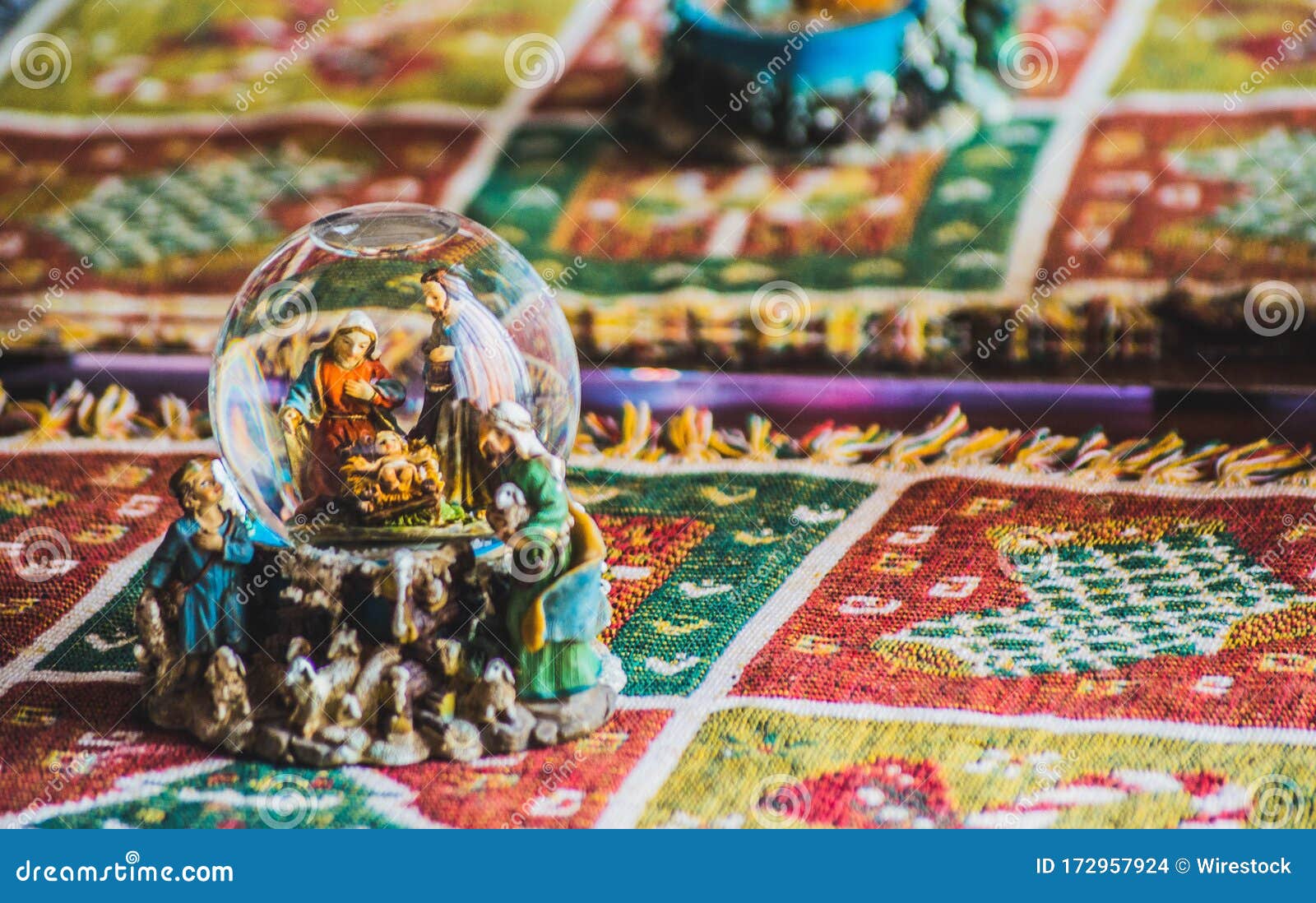 Transparent Nativity Scene Snow Globe on a Carpet Stock Photo - Image ...