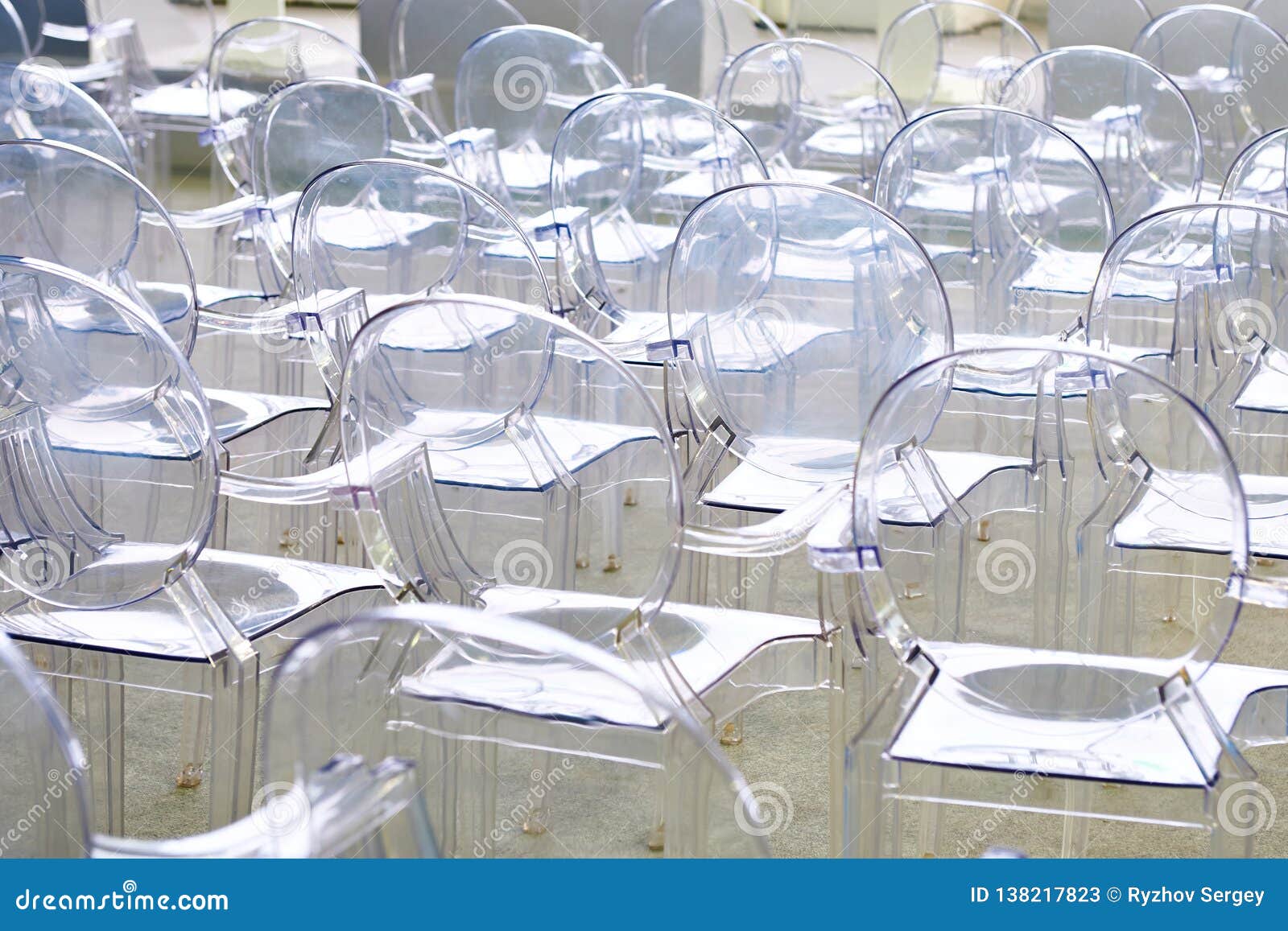Transparent plastic chairs stock image. Image of elegant - 138217823