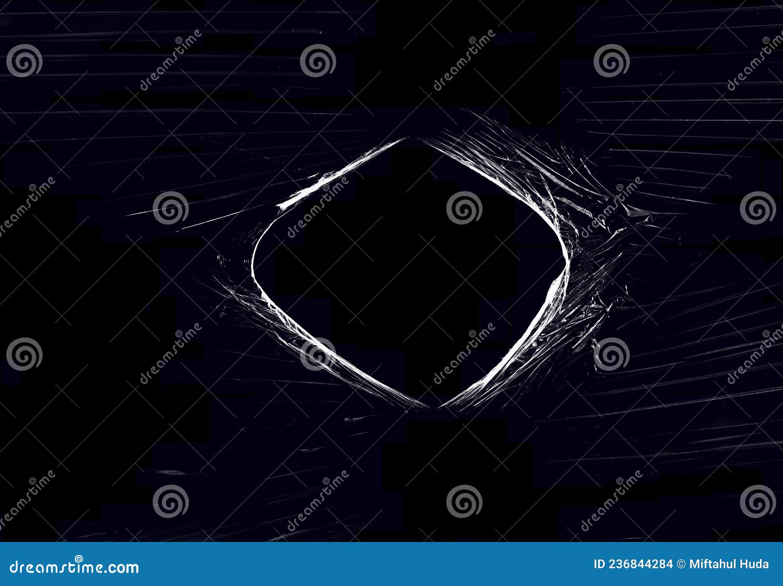A Transparent Plastic Wrap with a Hole on Black Background. Stock Photo ...