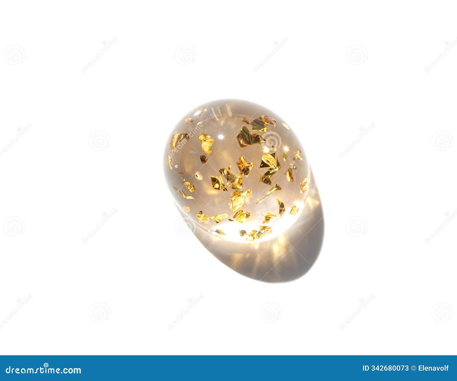 Transparent Resin Sphere with Gold Leaf Particles on White Background ...