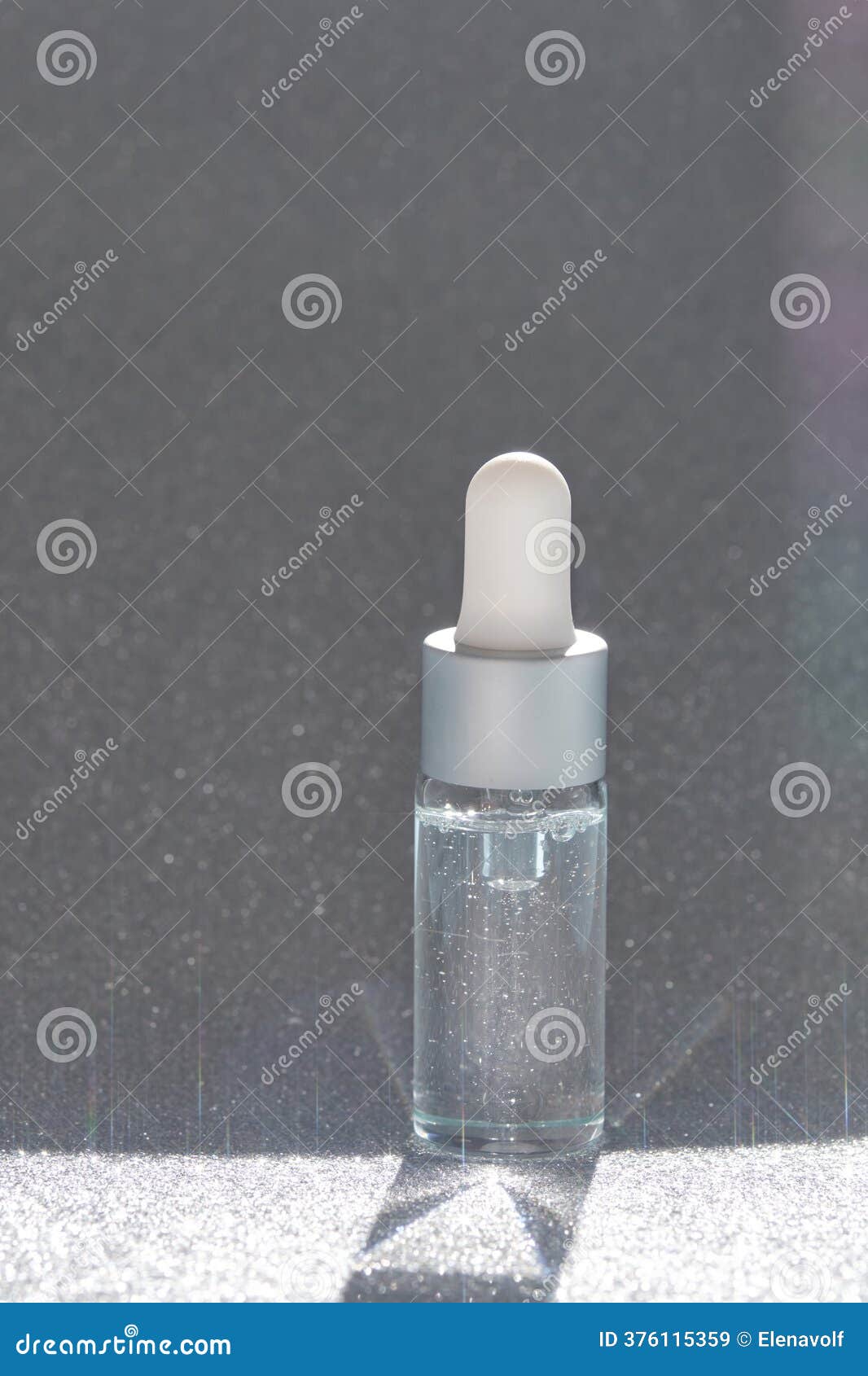 Transparent Serum With Gold Flakes And Droppers On White Background ...