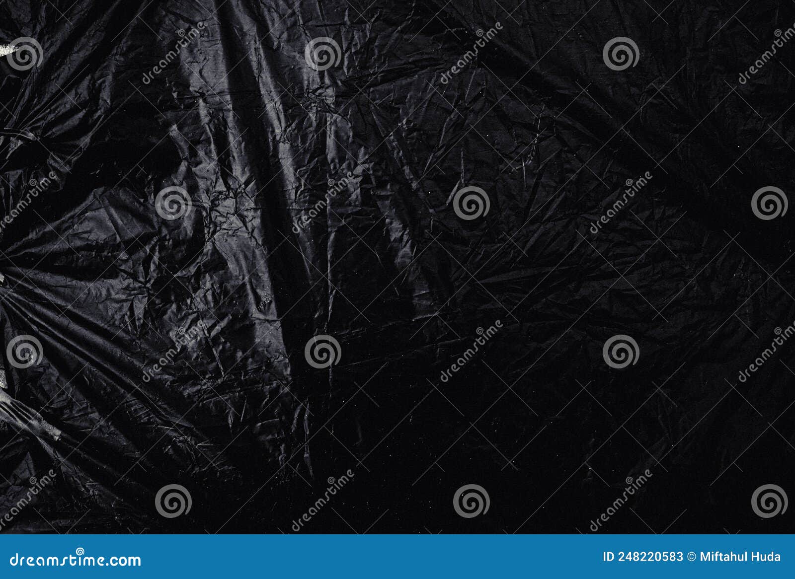 A Transparent Stretch Plastic Wrap Texture on Black Background. Rinkled ...