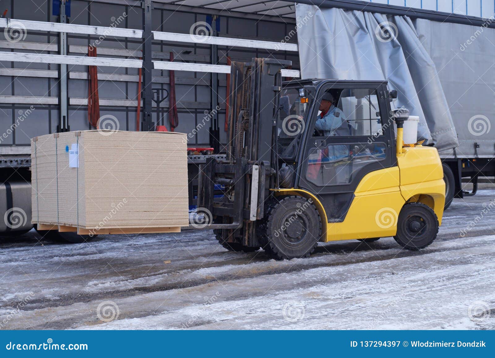 Forklift during Unloading of a Semi-trailer Truck. Transport Stock ...