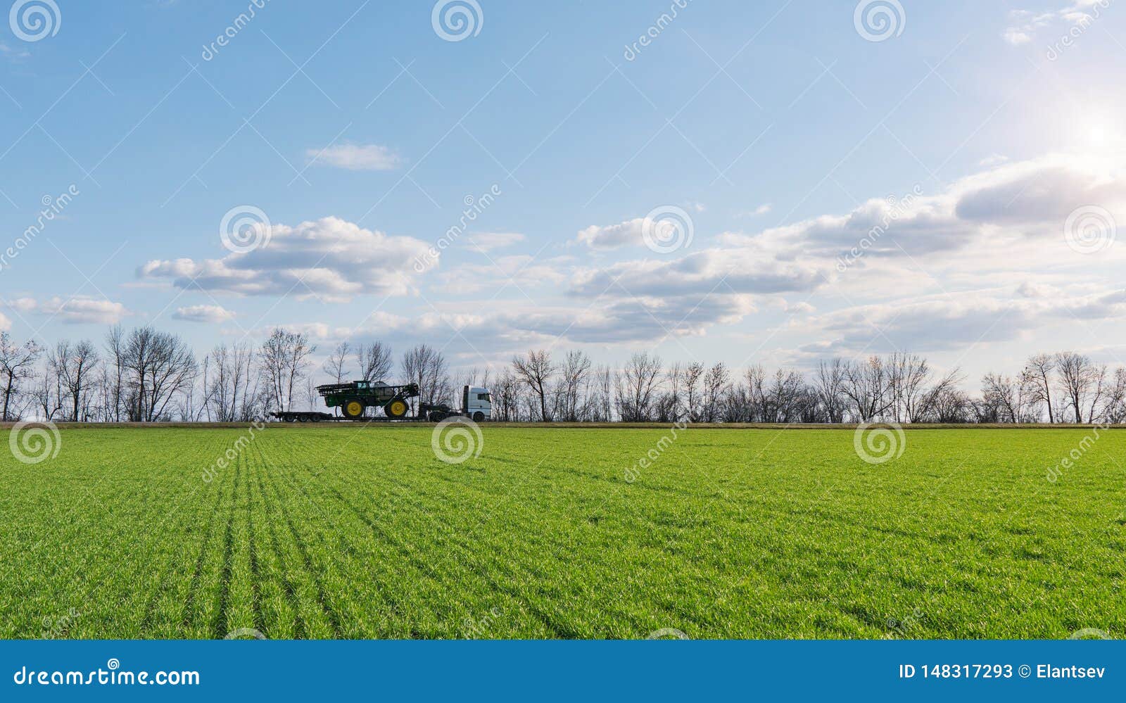 Transportation of Agricultural Machinery through Green Fields. Bright ...